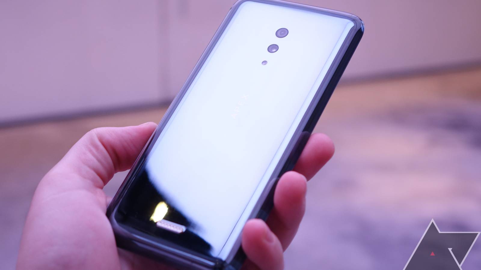 This phone has a full-screen fingerprint scanner, no USB port, and is ...